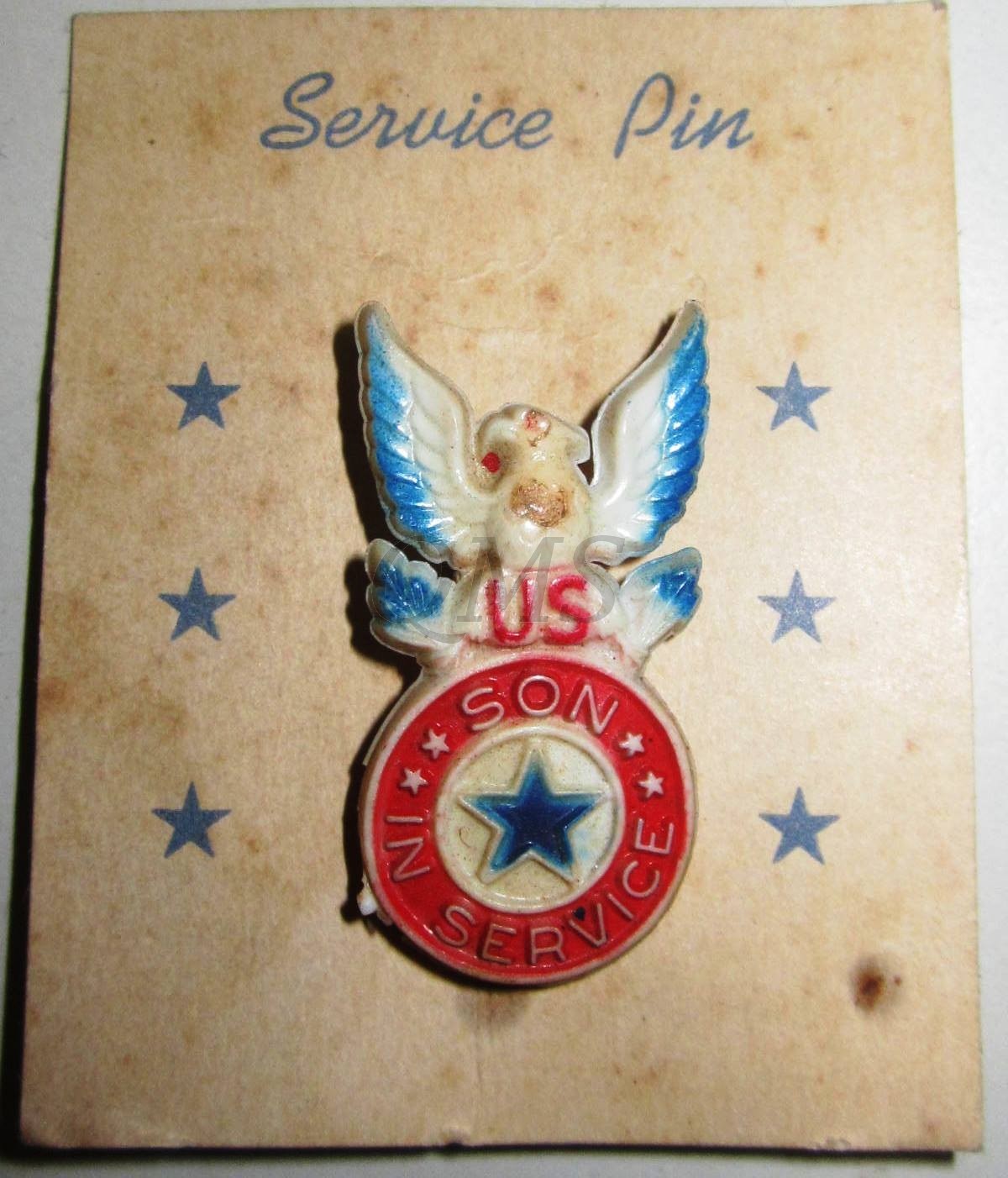 World War II son-in-service pin on original card