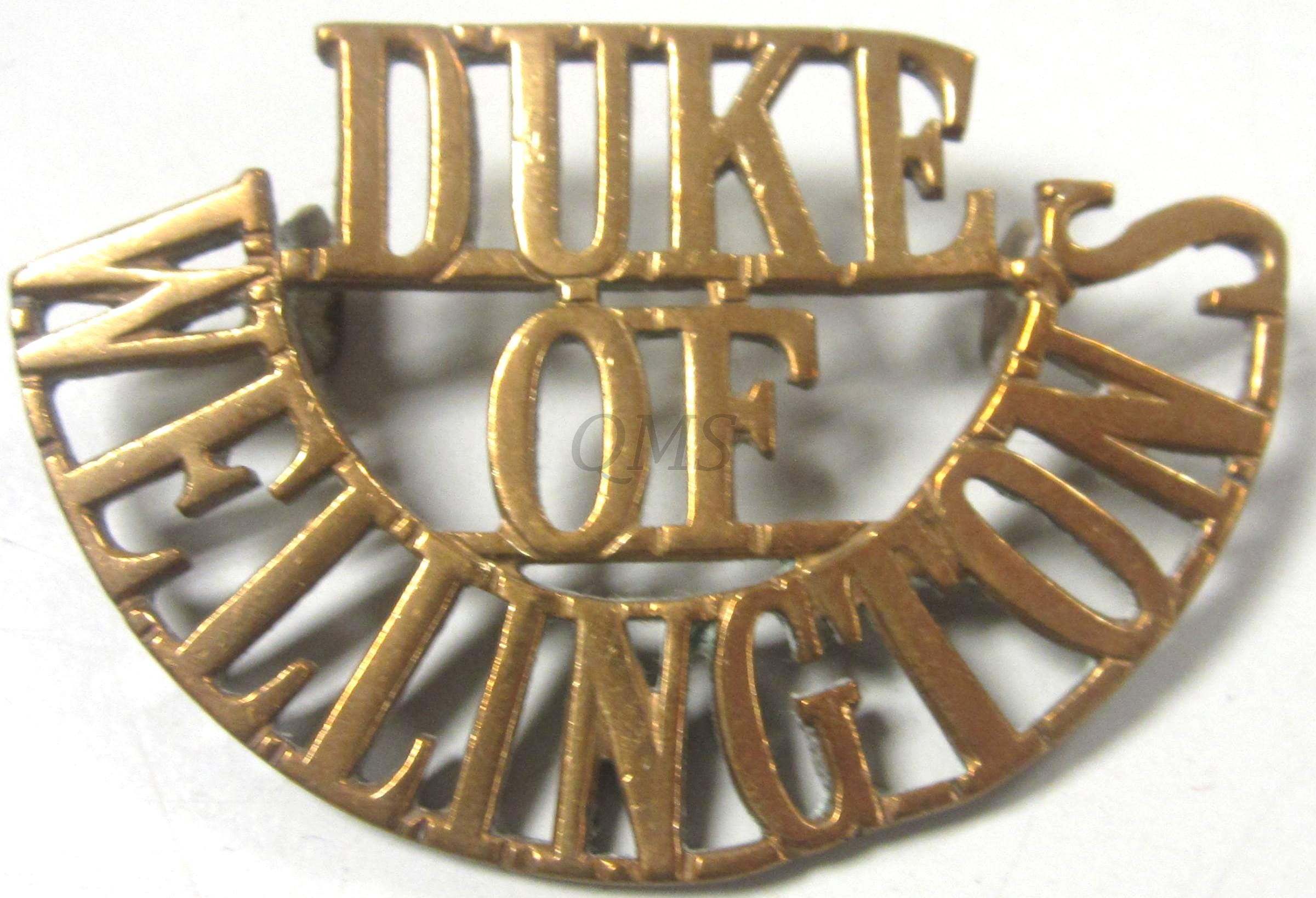 Shoulder title brass Duke of Wellington's Regiment